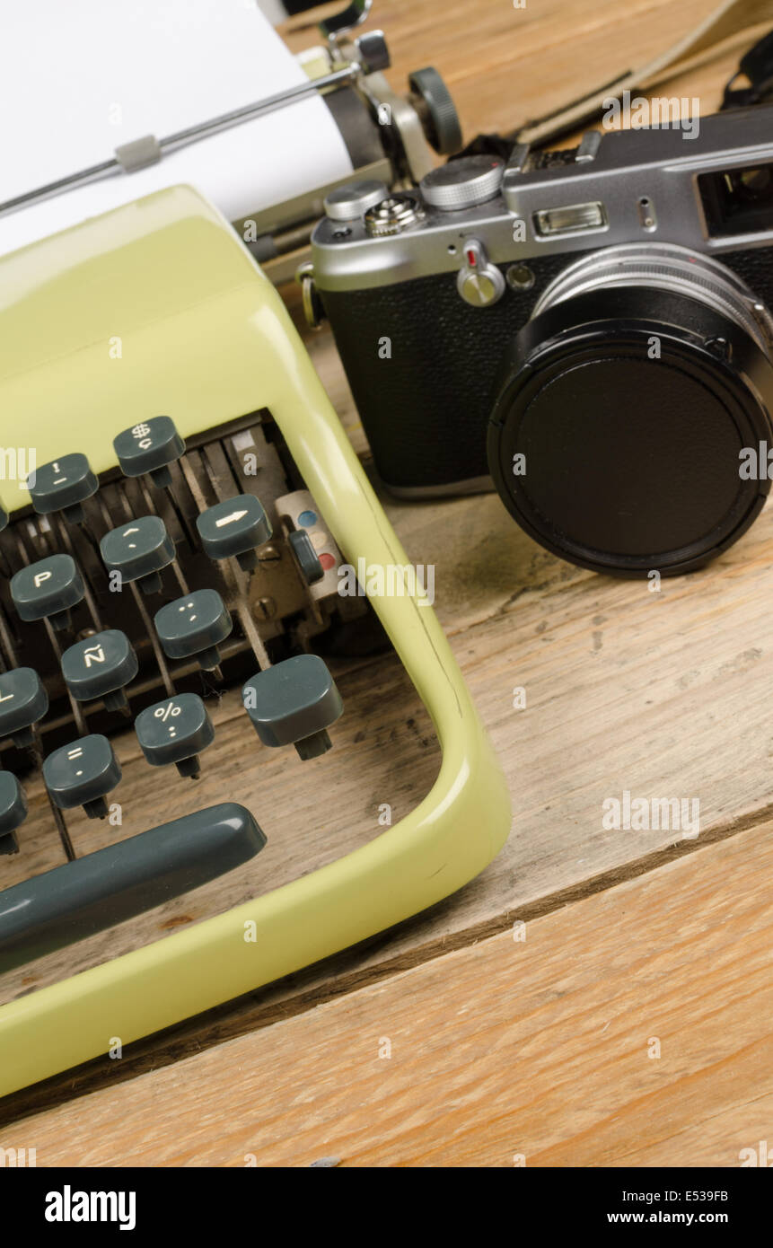 Retro typewriter and camera, classic journalist equipment Stock Photo ...