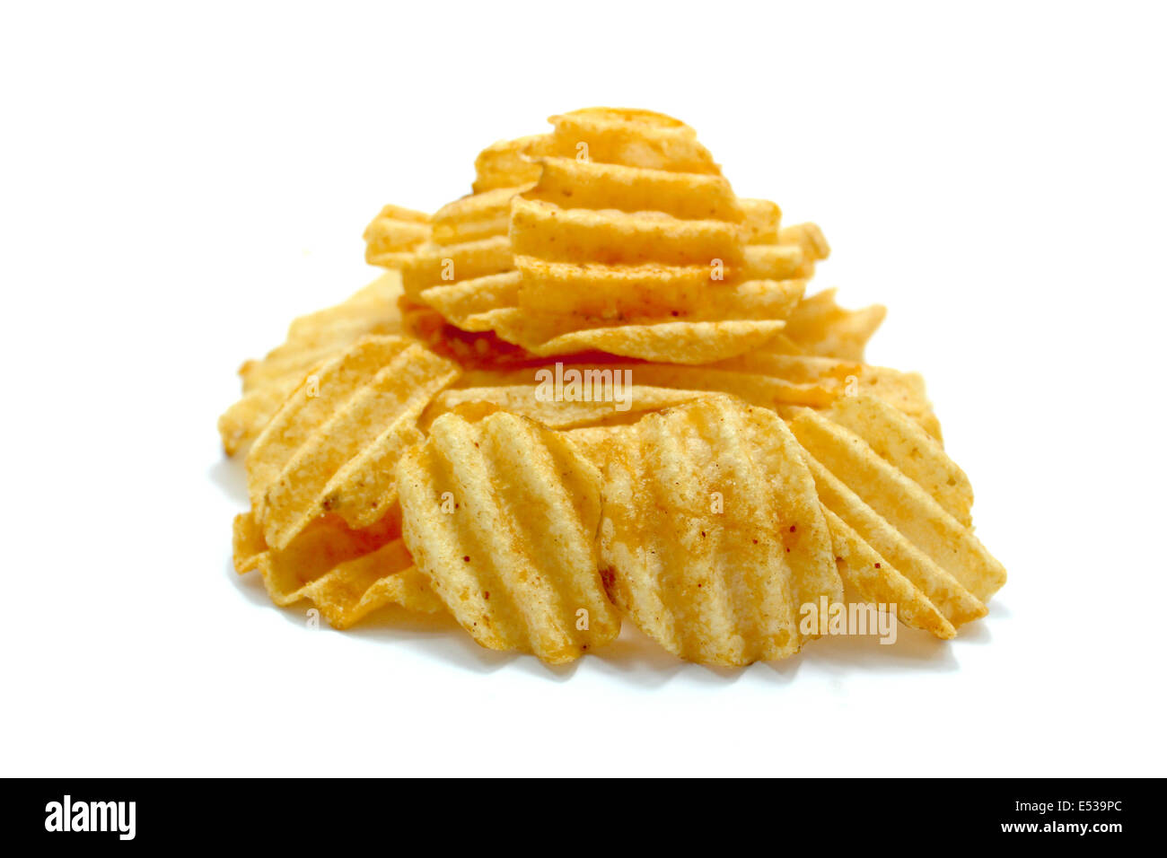 Snack potato chips heaps on a white background Stock Photo - Alamy