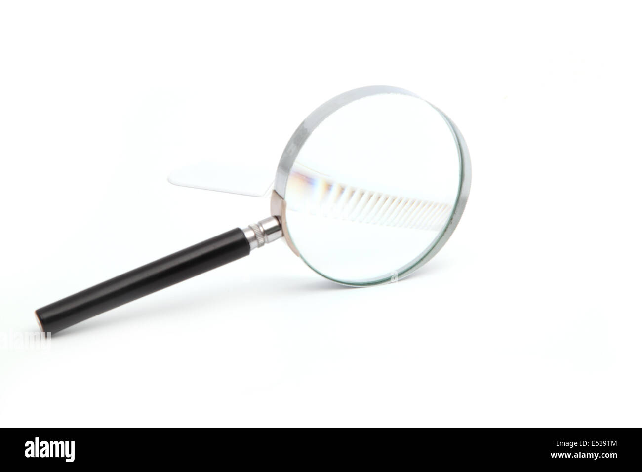 comb and magnifying glass Stock Photo - Alamy