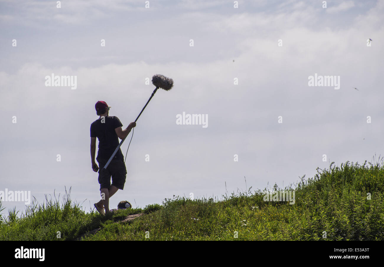 July 17, 2014 - Soundman with Long Microphone stand while filming on ...