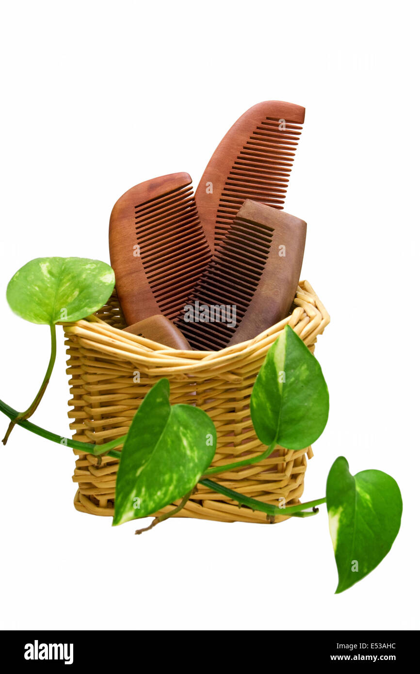 Wooden combs in the Rattan basket isolated on white background Stock ...