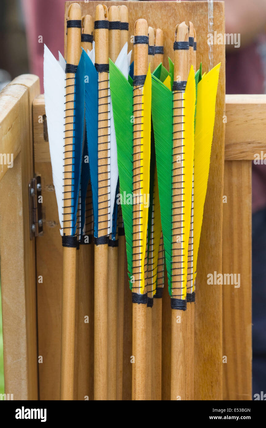 A Selection of plastic Arrows in a wooden container Stock Photo - Alamy