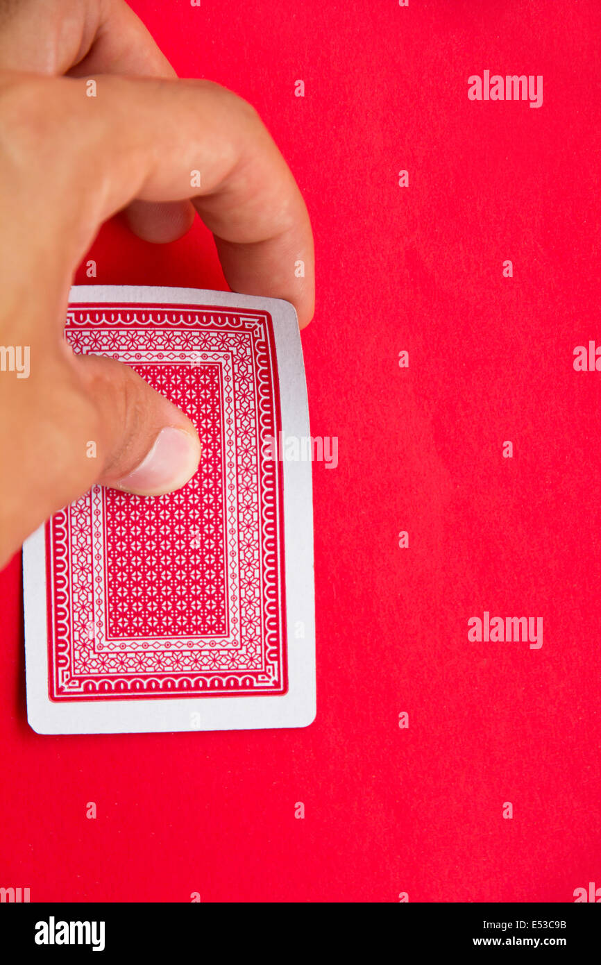 Hand Lifts The Card Stock Photo - Alamy