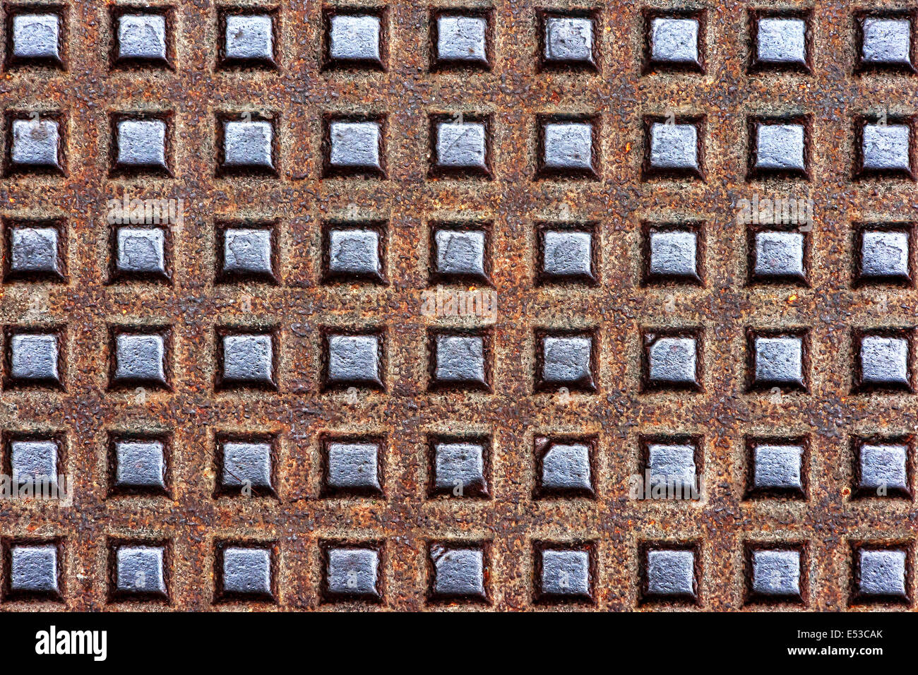 background of metallic textures on sewer manhole Stock Photo - Alamy