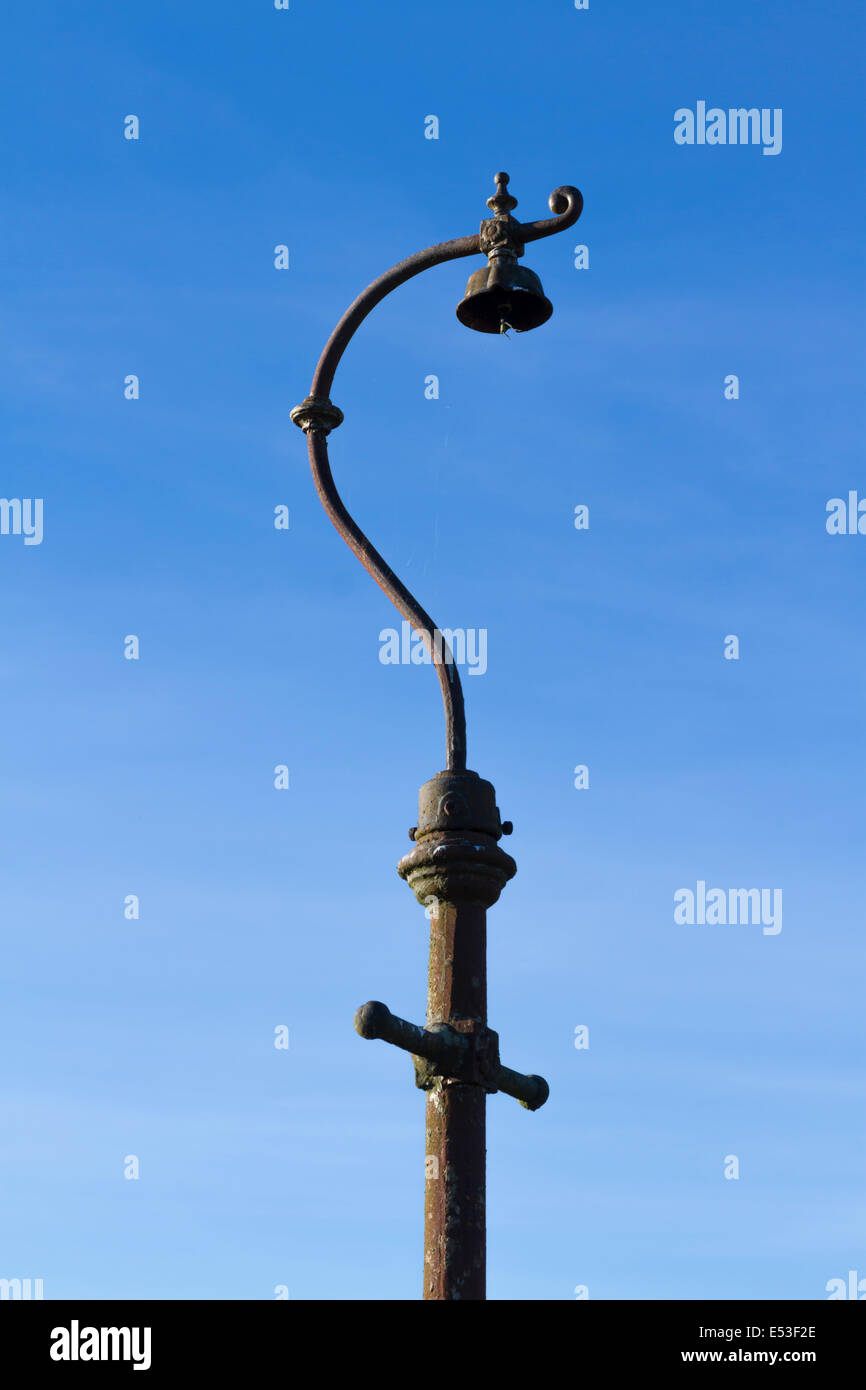 Old lamp post against blue sky Stock Photo - Alamy