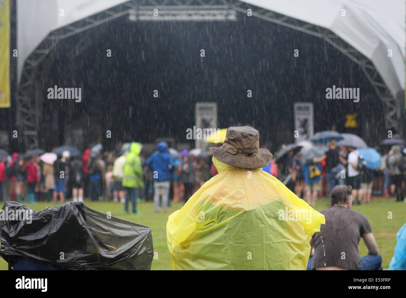 Festival-goers brave heavy rain and high humidity during Nottingham' s ...