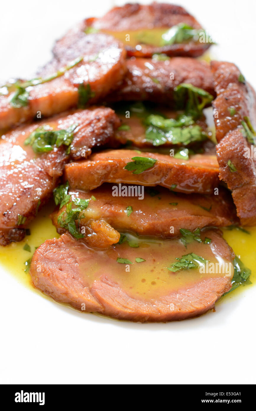 Red beef meat in the sauce isolated on white background Stock Photo - Alamy