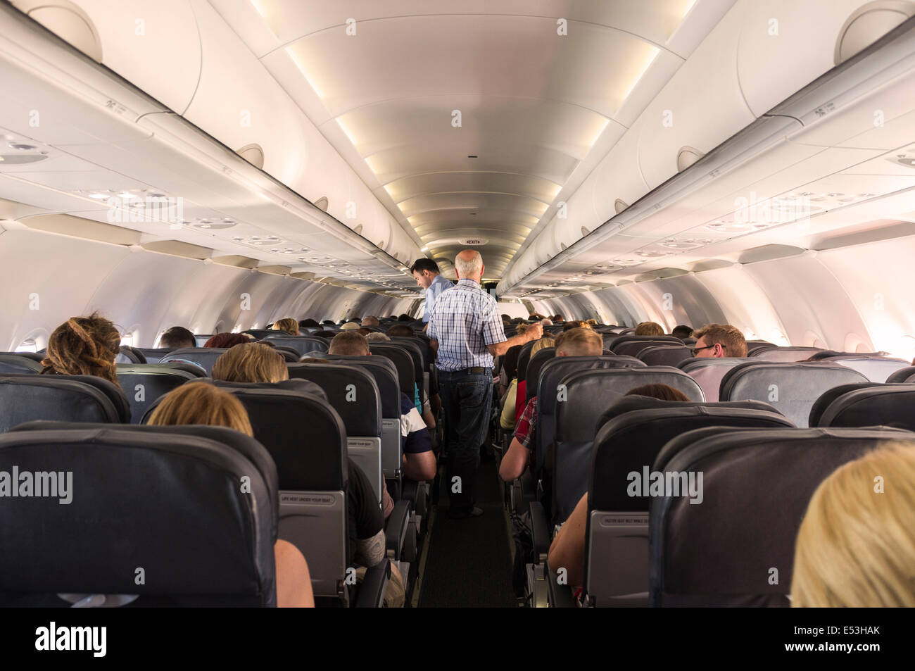 Cabin interior view of an Aer Lingus Airbus 320 in flight with ...