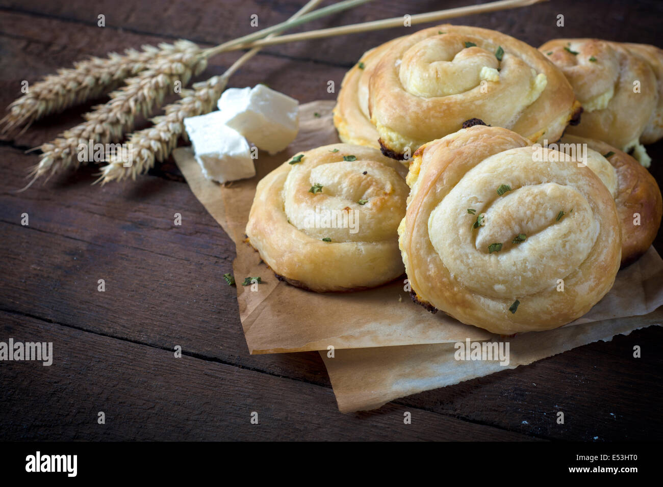 Mini cheese pies on the wooden table.Selective focus on the front mini ...