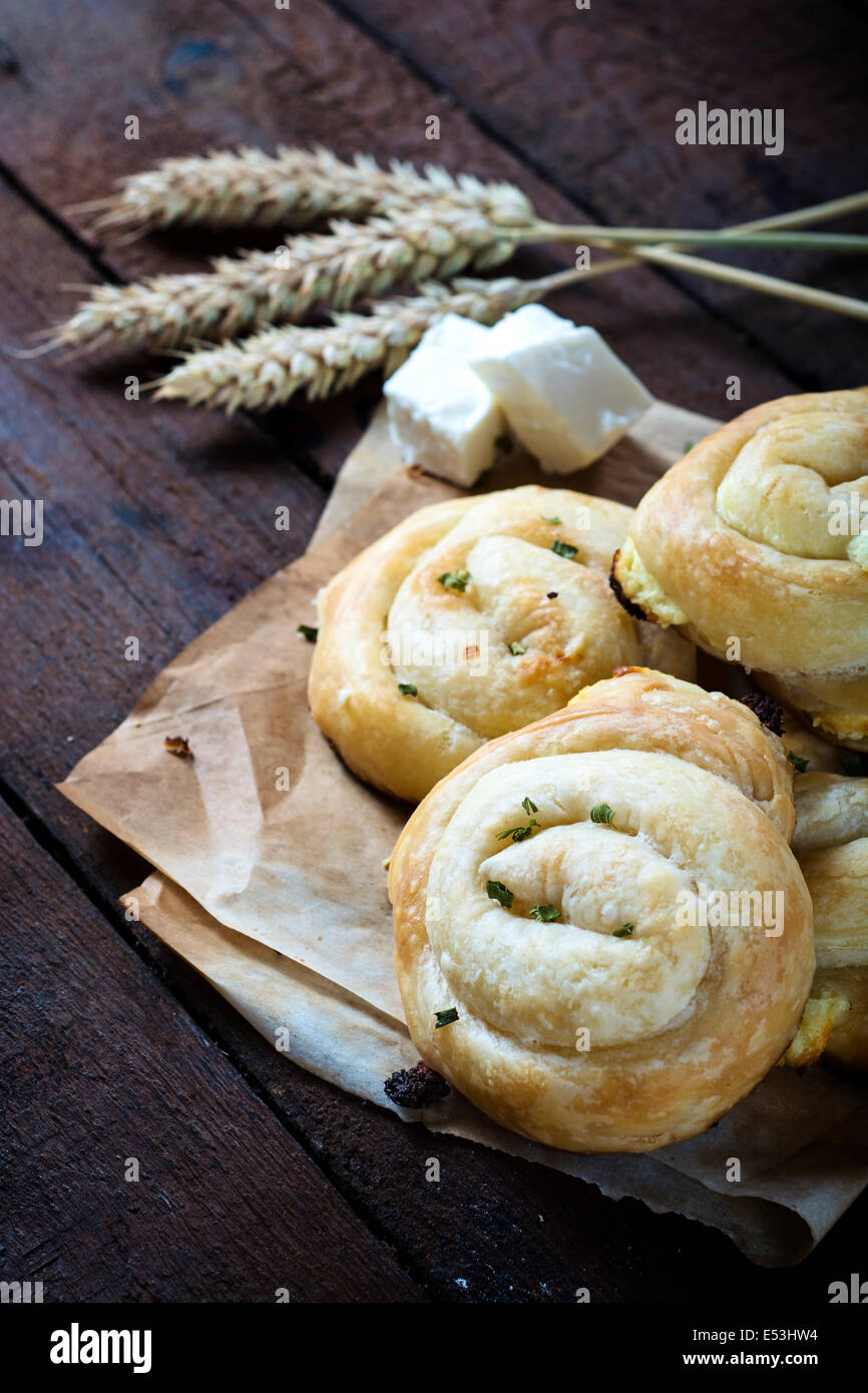 Baked mini cheese pastry on the wooden background Stock Photo - Alamy