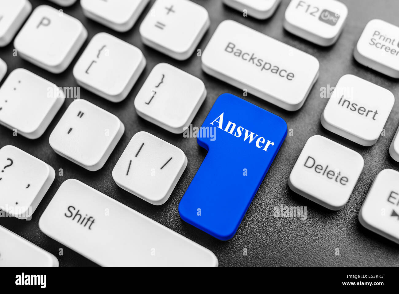 Large blue computer keyboard button with the word answer Stock Photo ...
