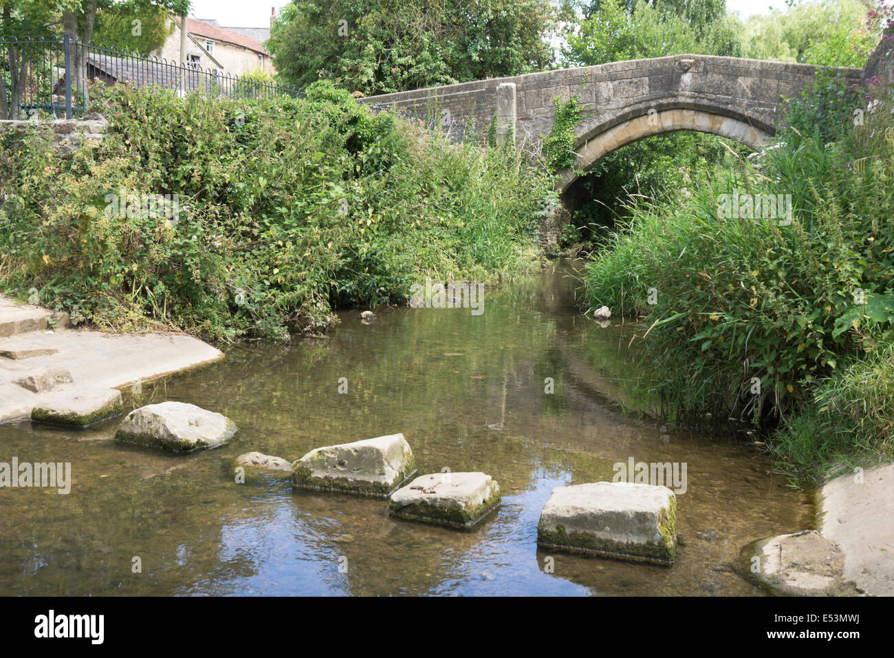 Bruton a small town in Somerset England UK River Brue bridge and ...