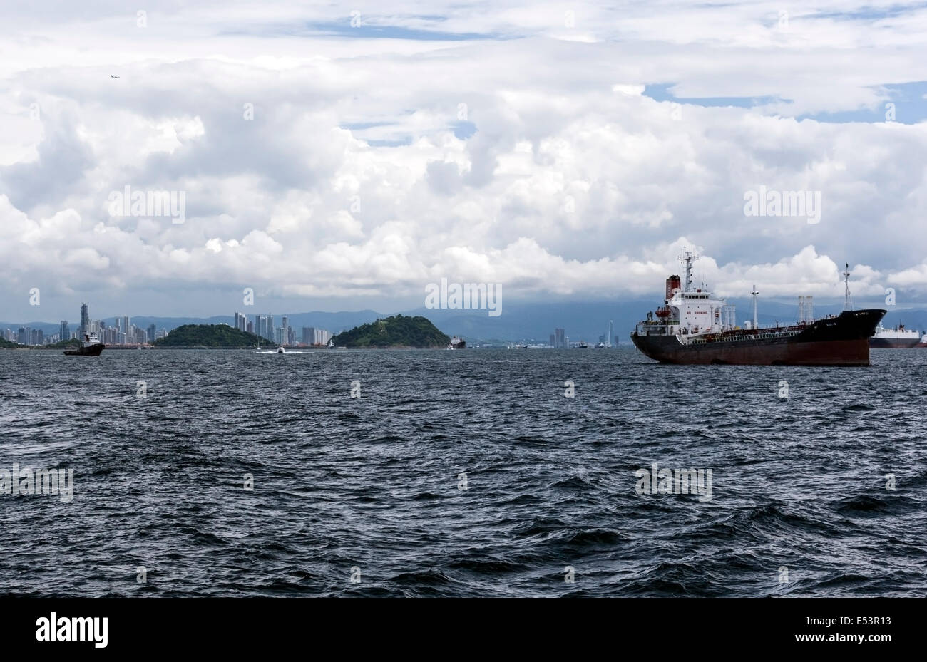 Cargo ships waiting to cross Panama Canal in the Gulf of Panama with ...