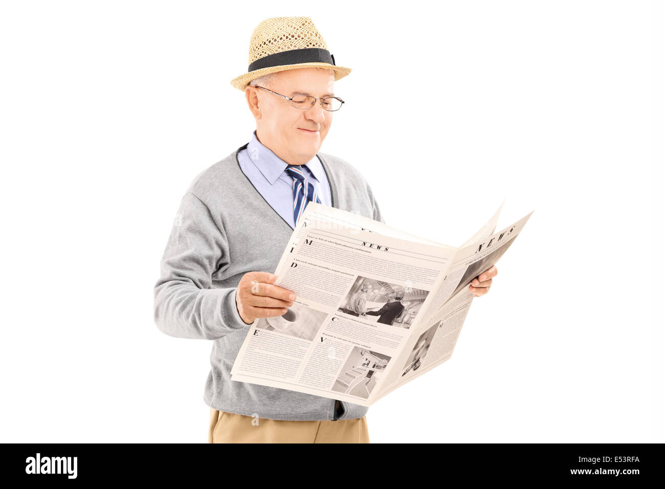 Senior gentleman reading a newspaper isolated Stock Photo - Alamy
