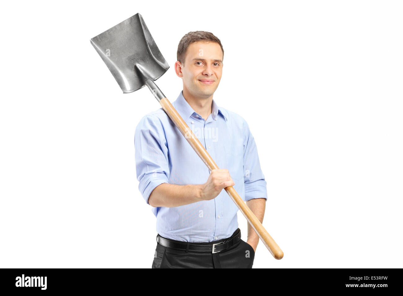 Young man posing with a shovel Stock Photo - Alamy
