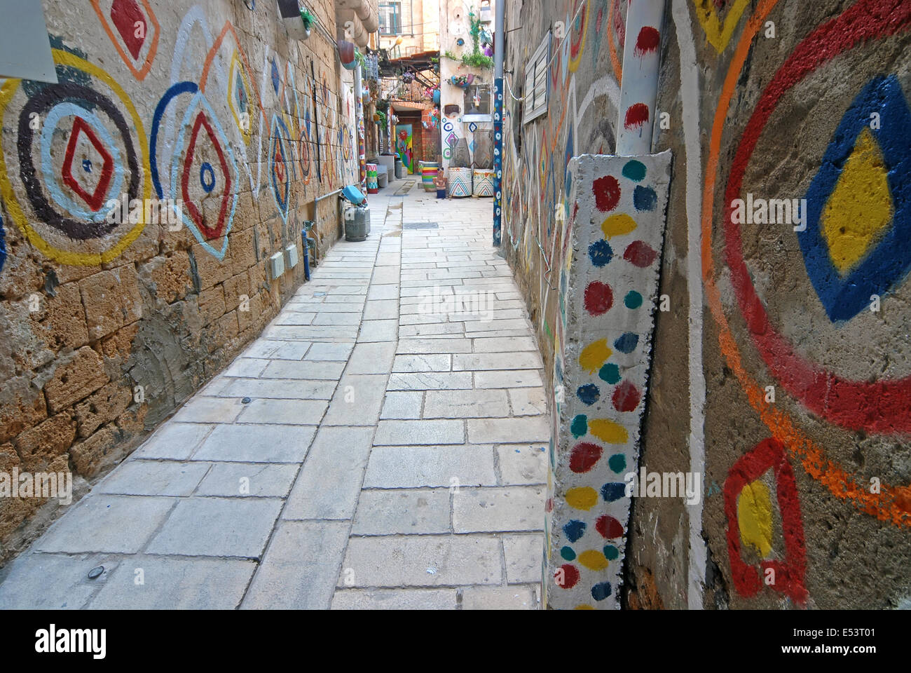 Acco, Color painted alley Stock Photo - Alamy