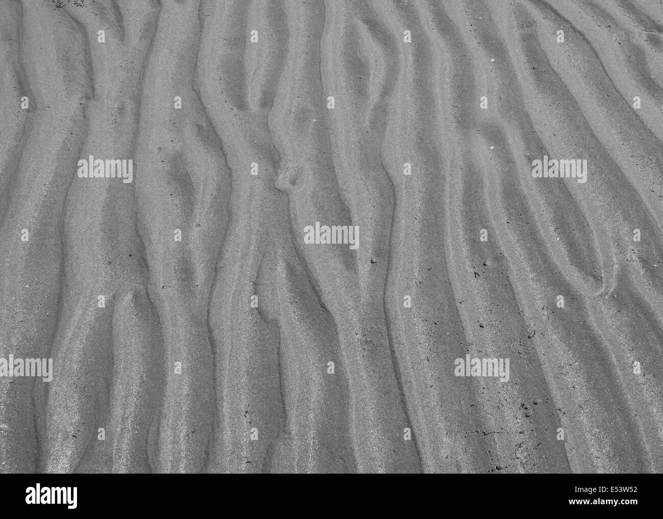 Wave line pattern in beach sand Stock Photo - Alamy