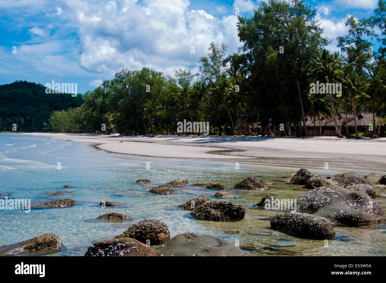 Beautiful tropical beach with white sand, blue waters and colorful ...