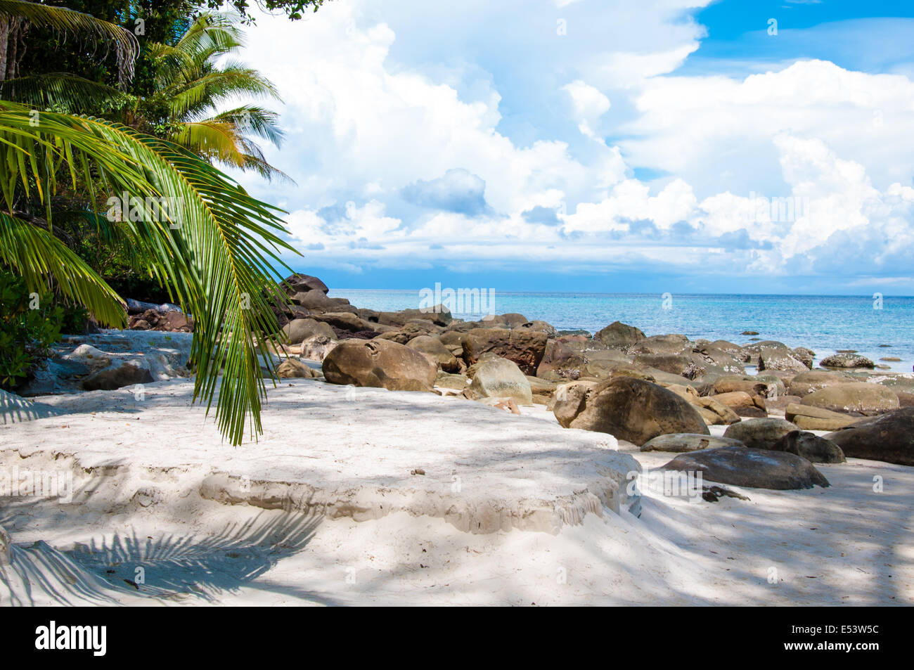 Beautiful tropical beach with white sand, blue waters and colorful ...