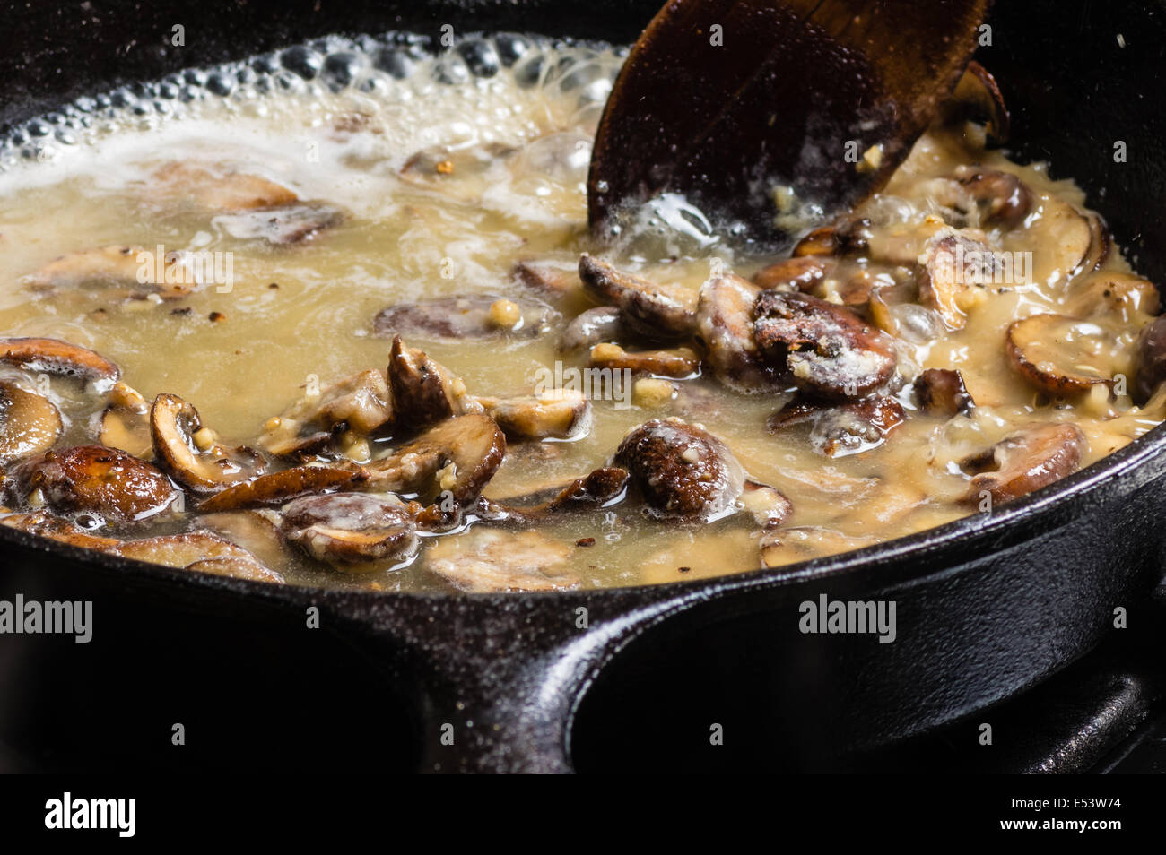 Making mushroom gravy or rue in a cast iron skillet Stock Photo - Alamy