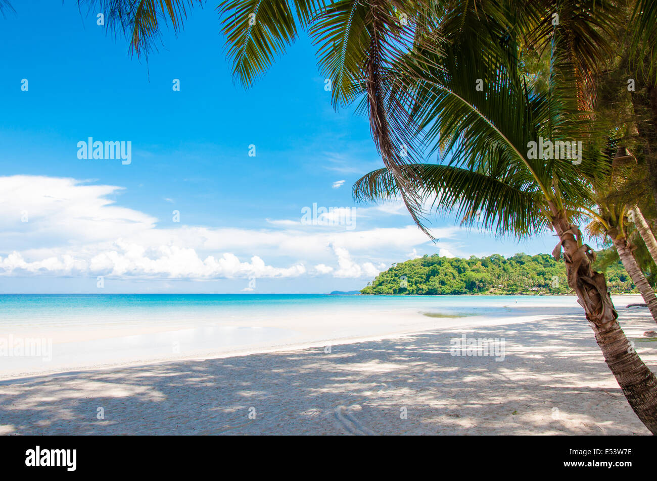 Beautiful tropical beach with white sand, blue waters and colorful ...