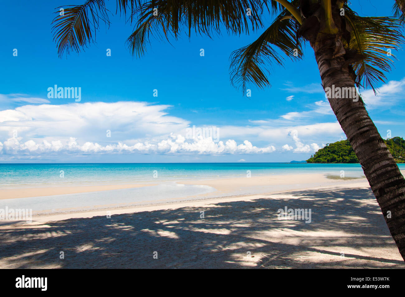Beautiful tropical beach with white sand, blue waters and colorful ...