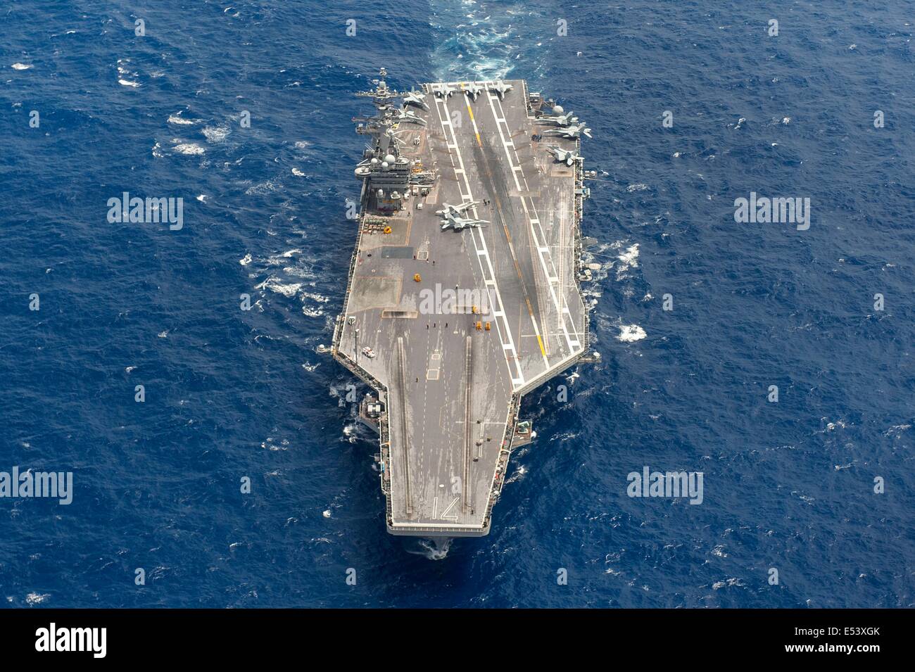 US Navy Nimitz-class aircraft carrier USS Theodore Roosevelt July 16, 2014 in the Atlantic Ocean ...