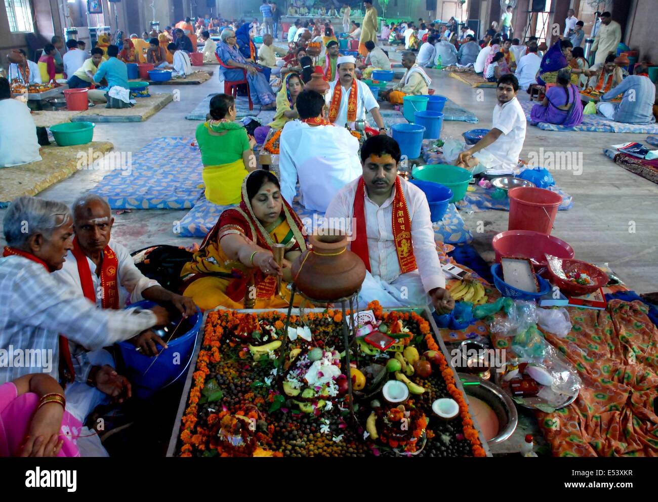 Devotees perform rituals during the Rudra Abhishek Pooja in Sawan month ...