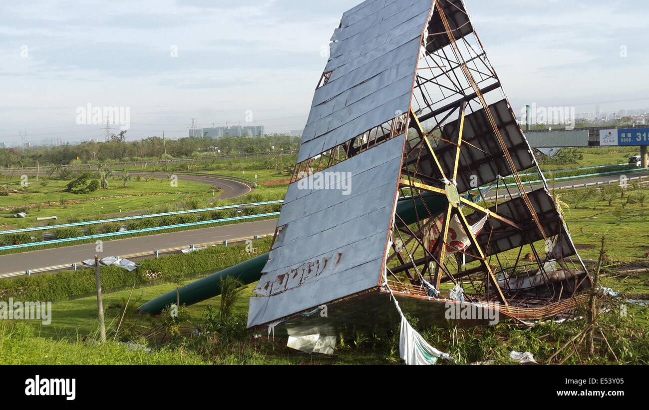 Haikou. 20th July, 2014. An advertisment board falls after landfall of ...