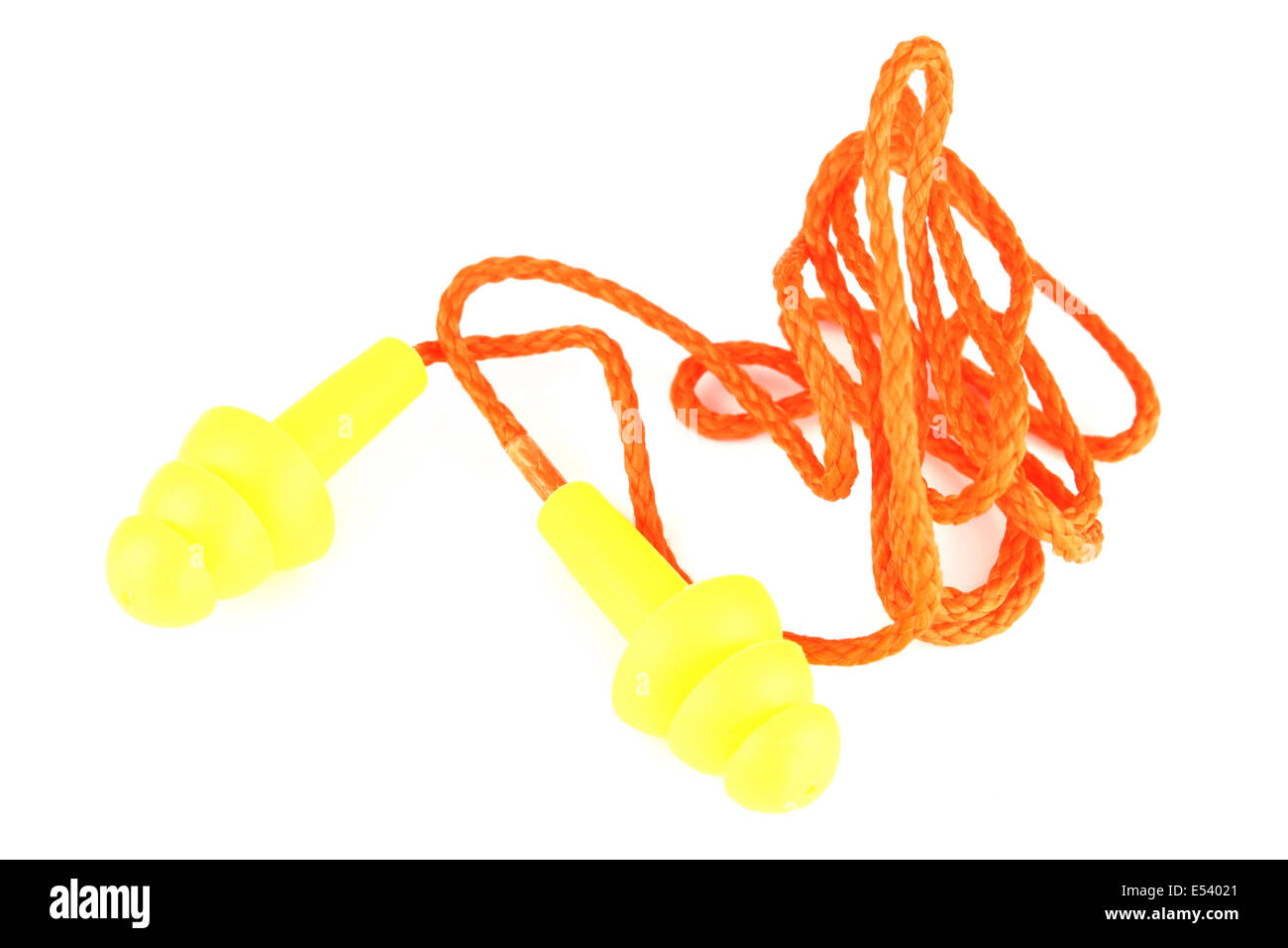 Yellow ear plug on a white background Stock Photo - Alamy