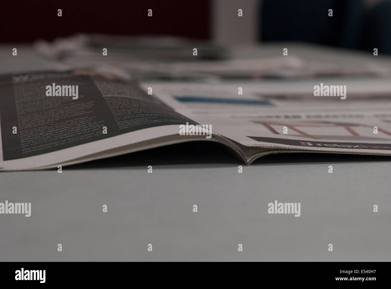 Newspaper on table Stock Photo - Alamy