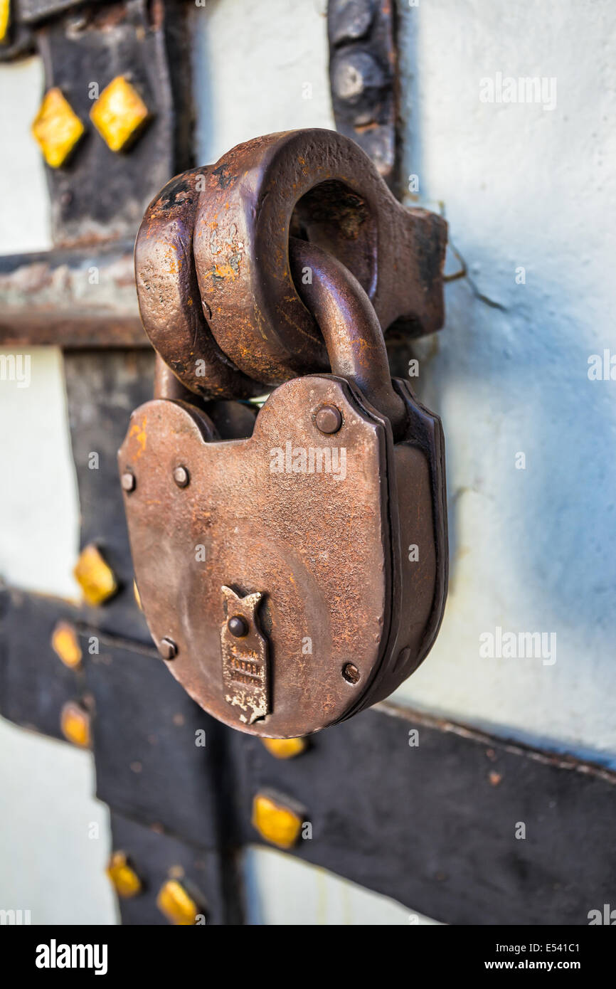 rusty lock with deadbolt on the old door Stock Photo - Alamy