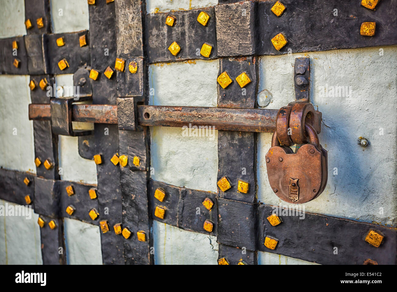rusty lock with deadbolt on the old door Stock Photo - Alamy