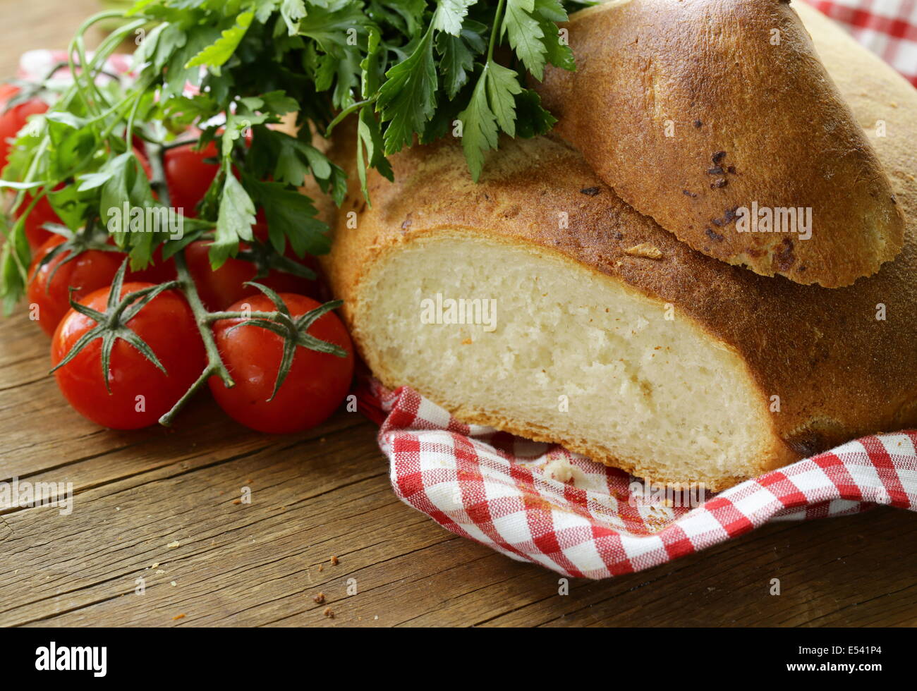 traditional Italian ciabatta bread with tomatoes and herbs Stock Photo ...