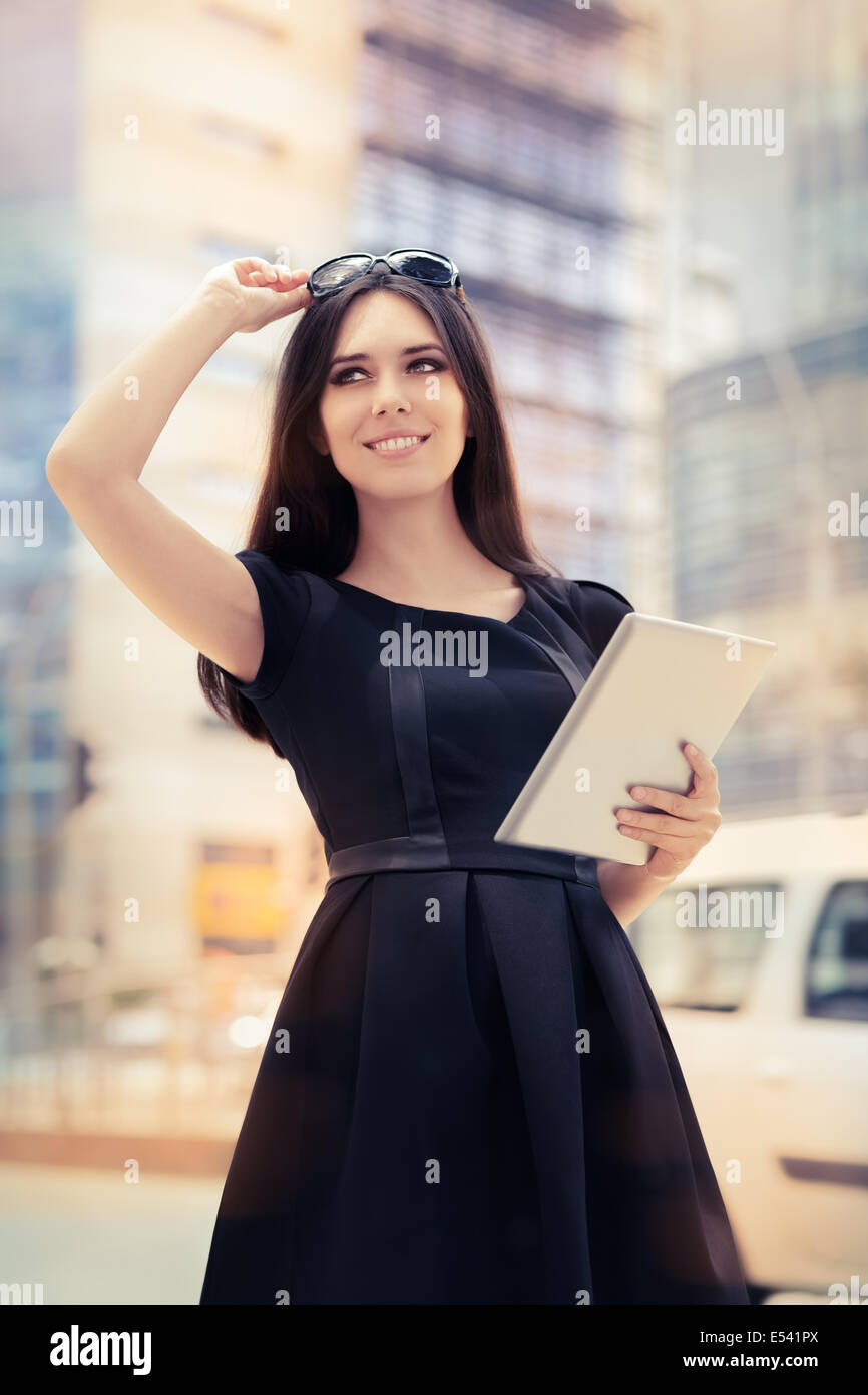 Young Woman with Tablet Out in the City Stock Photo - Alamy
