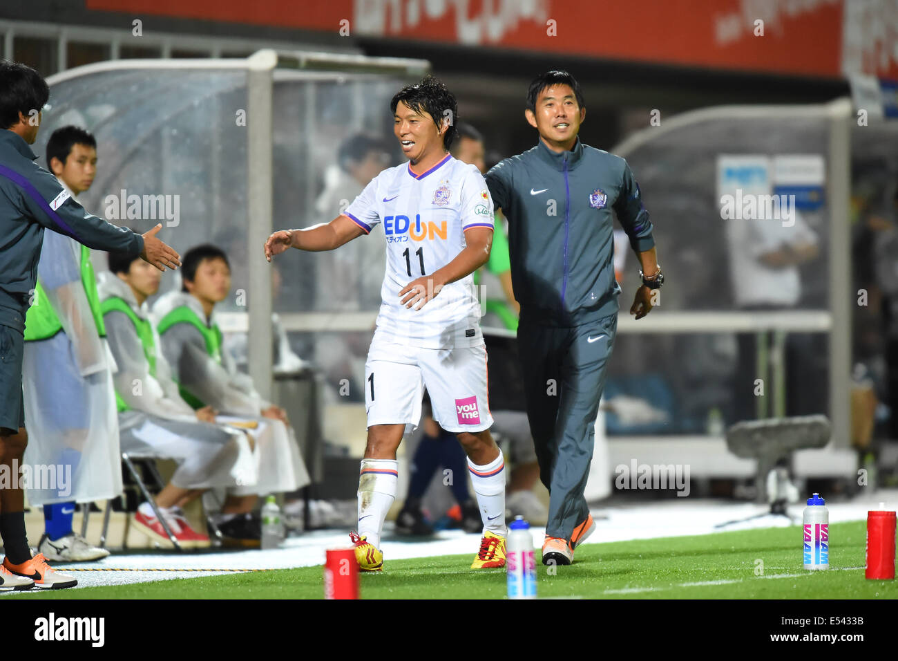 NACK5 Stadium Omiya, Saitama, Japan. 19th July, 2014. (L to R) Hisato Sato, Hajime Moriyasu ...