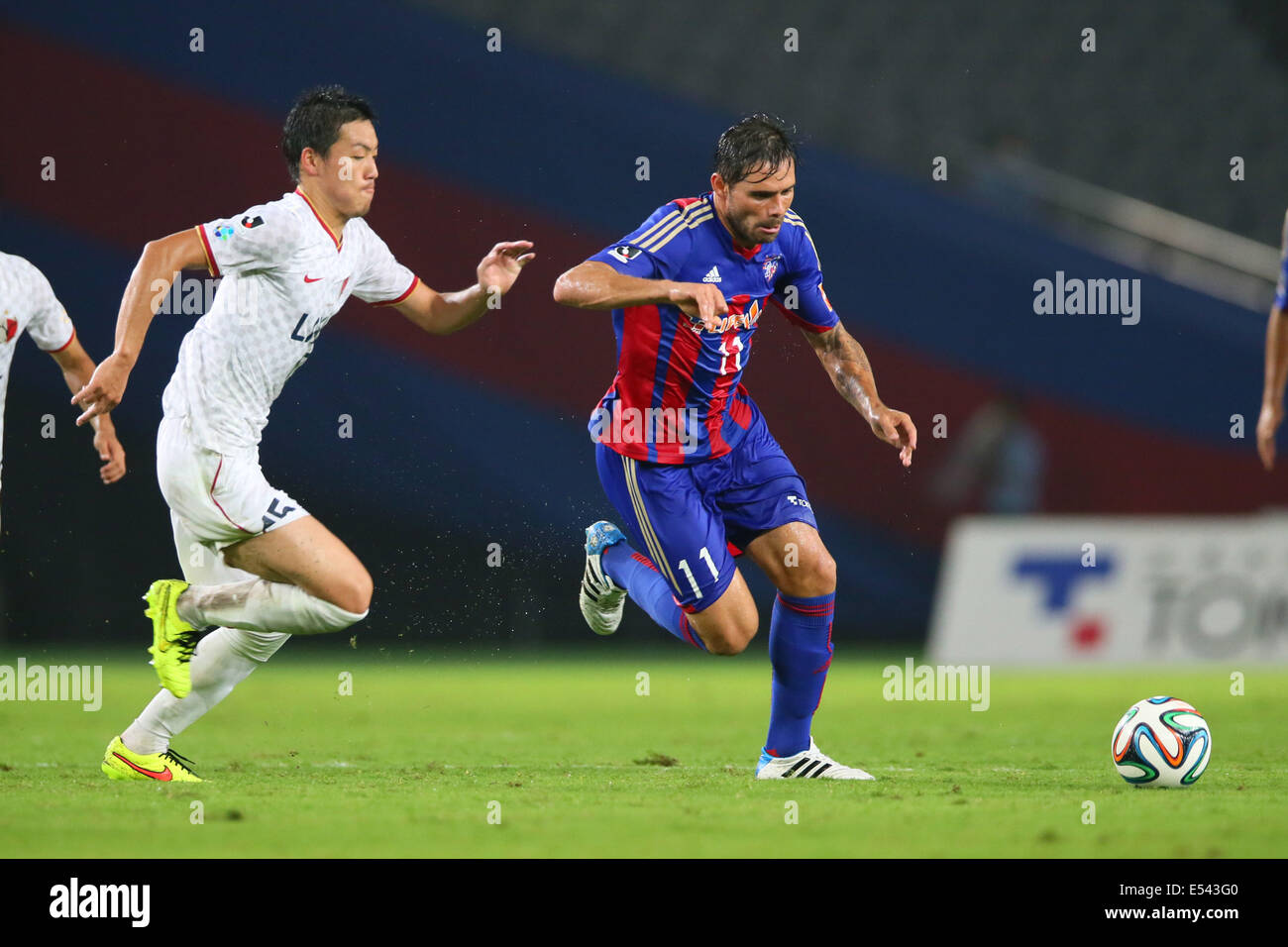 NACK5 Stadium Omiya, Saitama, Japan. 19th July, 2014. (L-R) Gen Shoji (Antlers), Edu (FC Tokyo ...