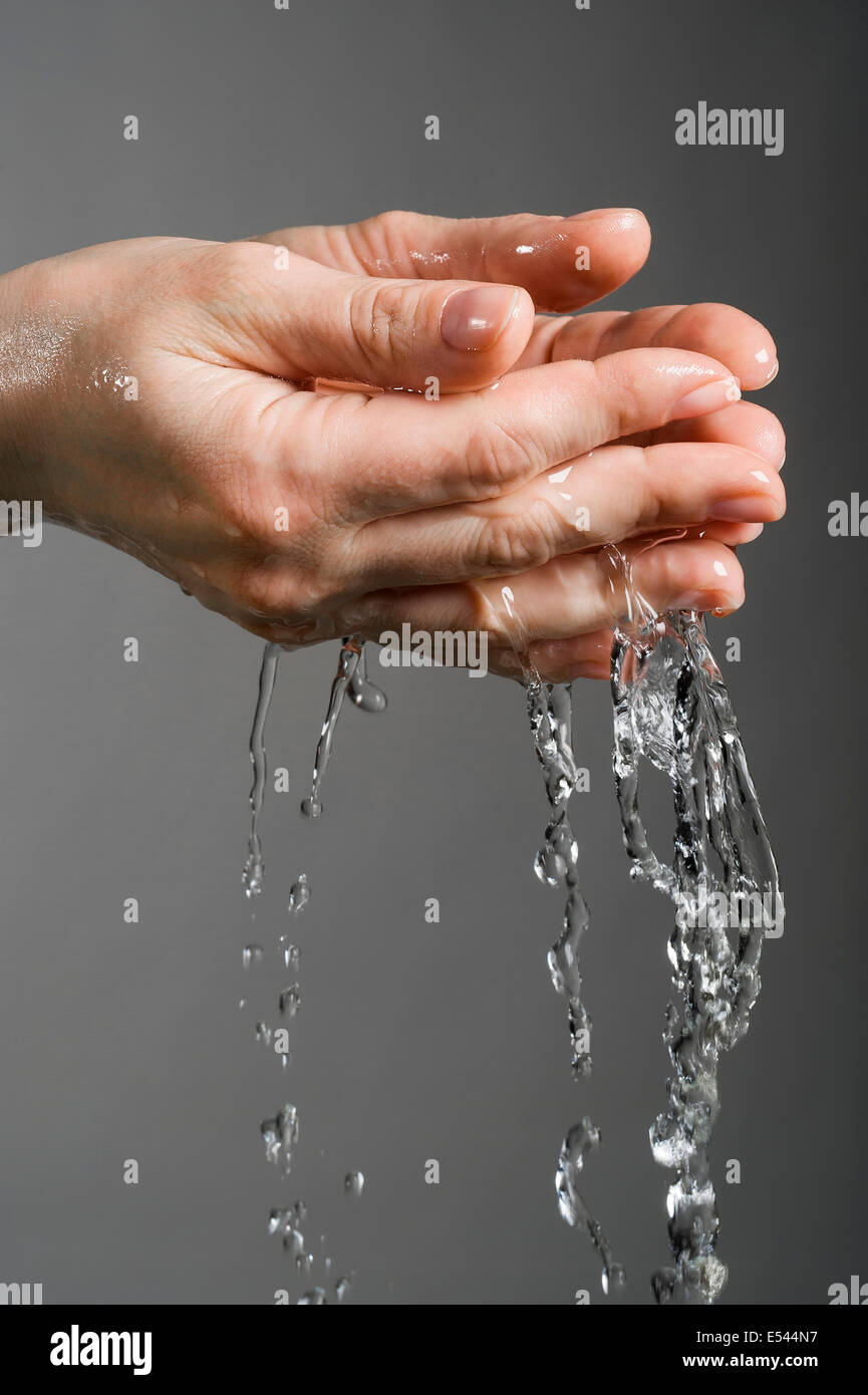 water in hand Stock Photo - Alamy