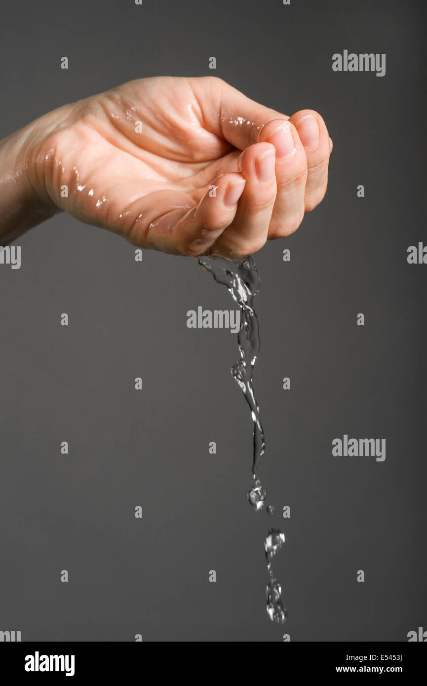 water in hand Stock Photo - Alamy