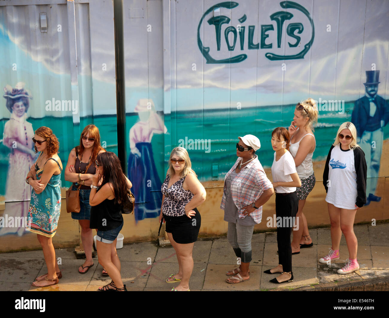Women queue for the toilet on the Brighton seafront Stock Photo - Alamy