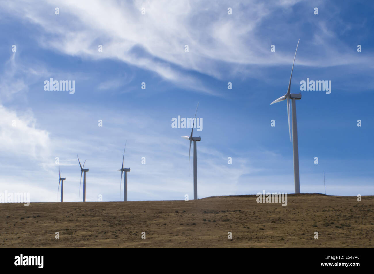Wind turbines producing electricity Stock Photo - Alamy