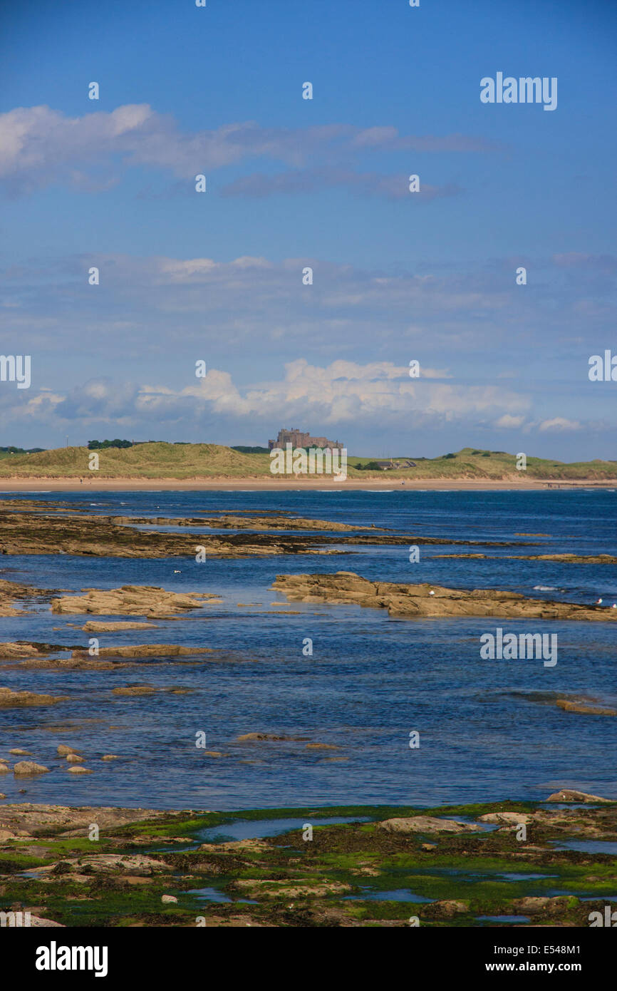 Bamburgh Castle from Seahouses Northumberland UK Stock Photo - Alamy