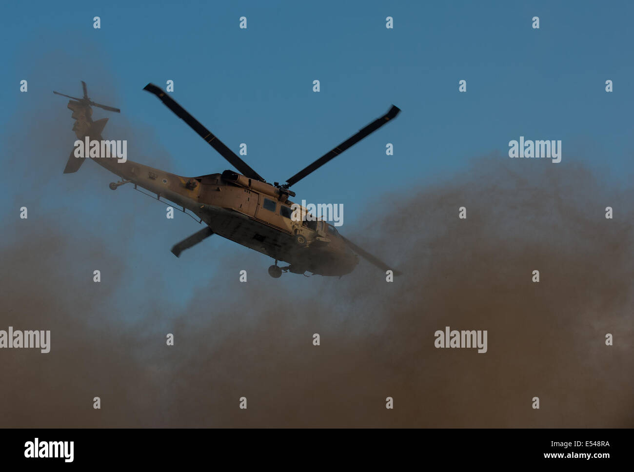 Israel. 20th July, 2014. An Israeli Apache helicopter takes off in ...