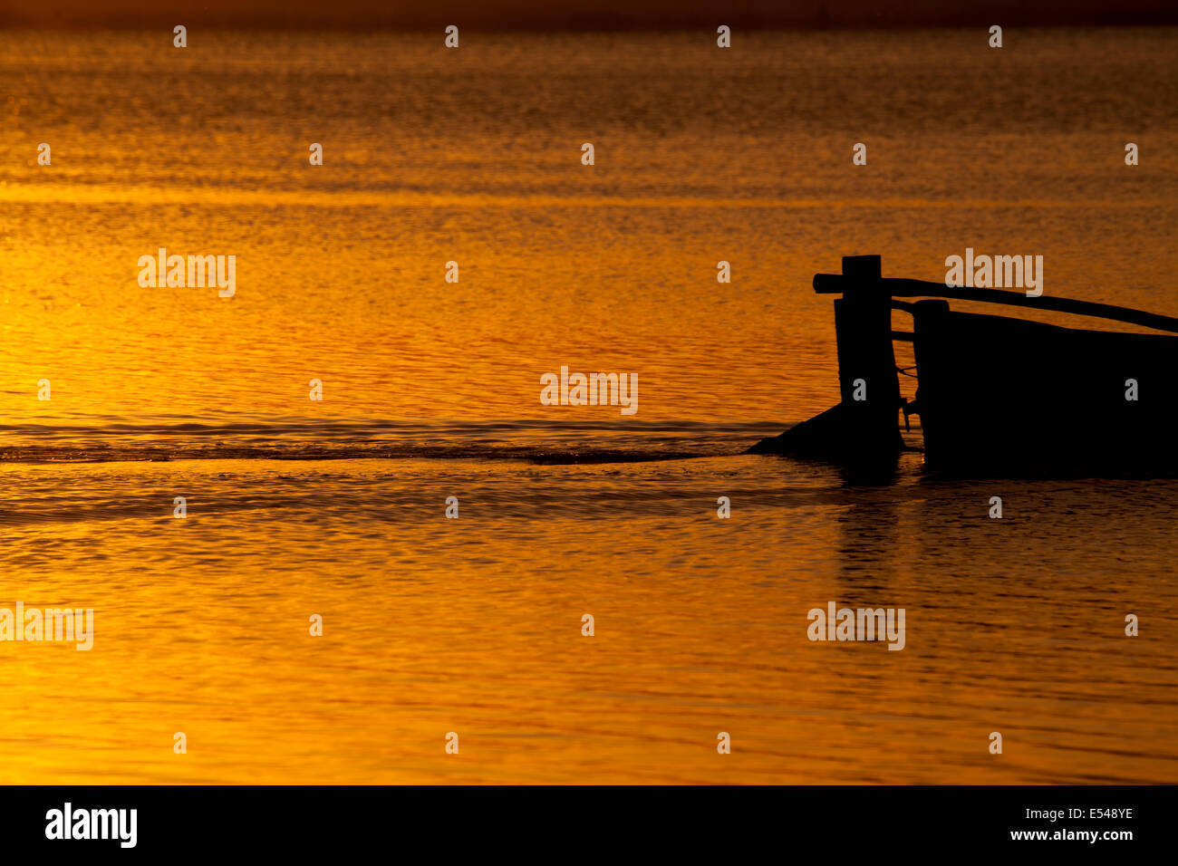 boat and sunset Stock Photo - Alamy
