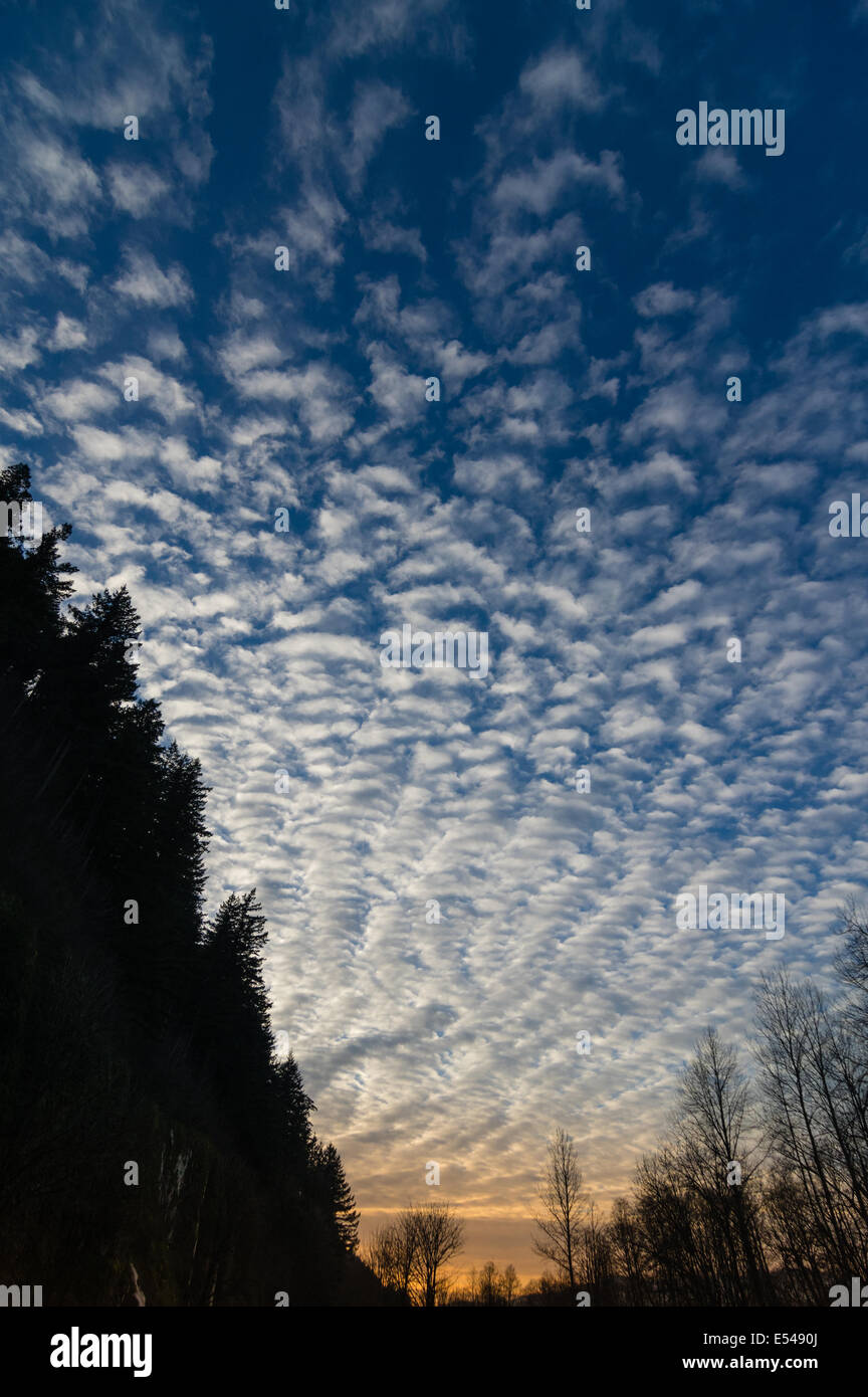 Dramatic sunset clouds stormy white layers Stock Photo - Alamy