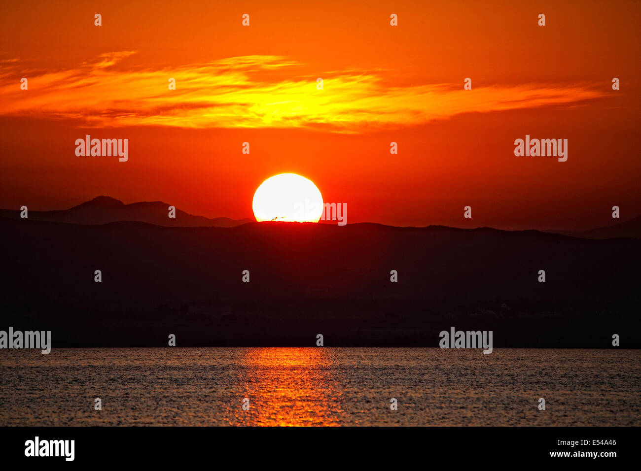 Red sunset and water Stock Photo - Alamy