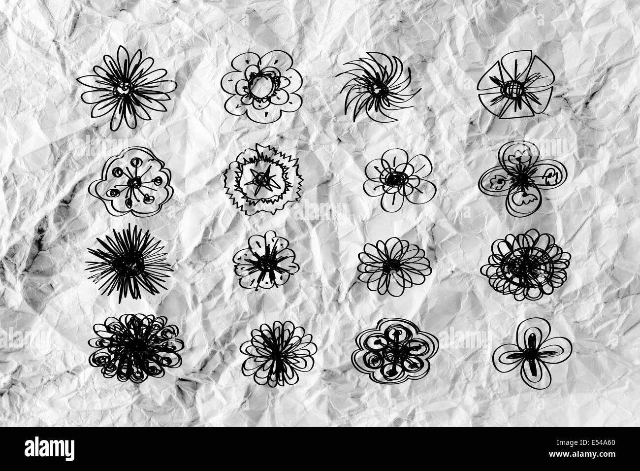 Flowers design on crumpled paper Stock Photo - Alamy