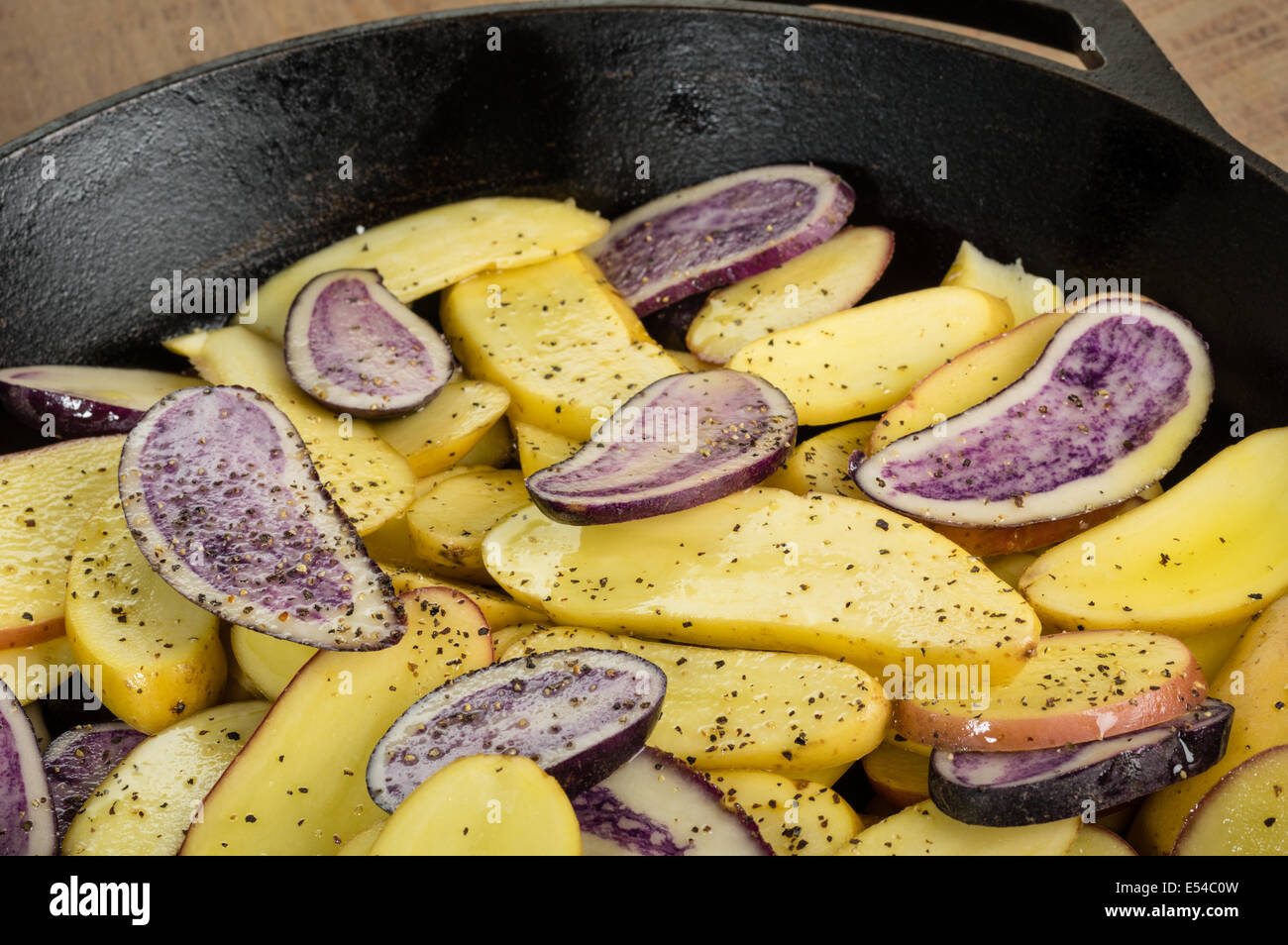Preparing potatoes in iron hi-res stock photography and images - Alamy