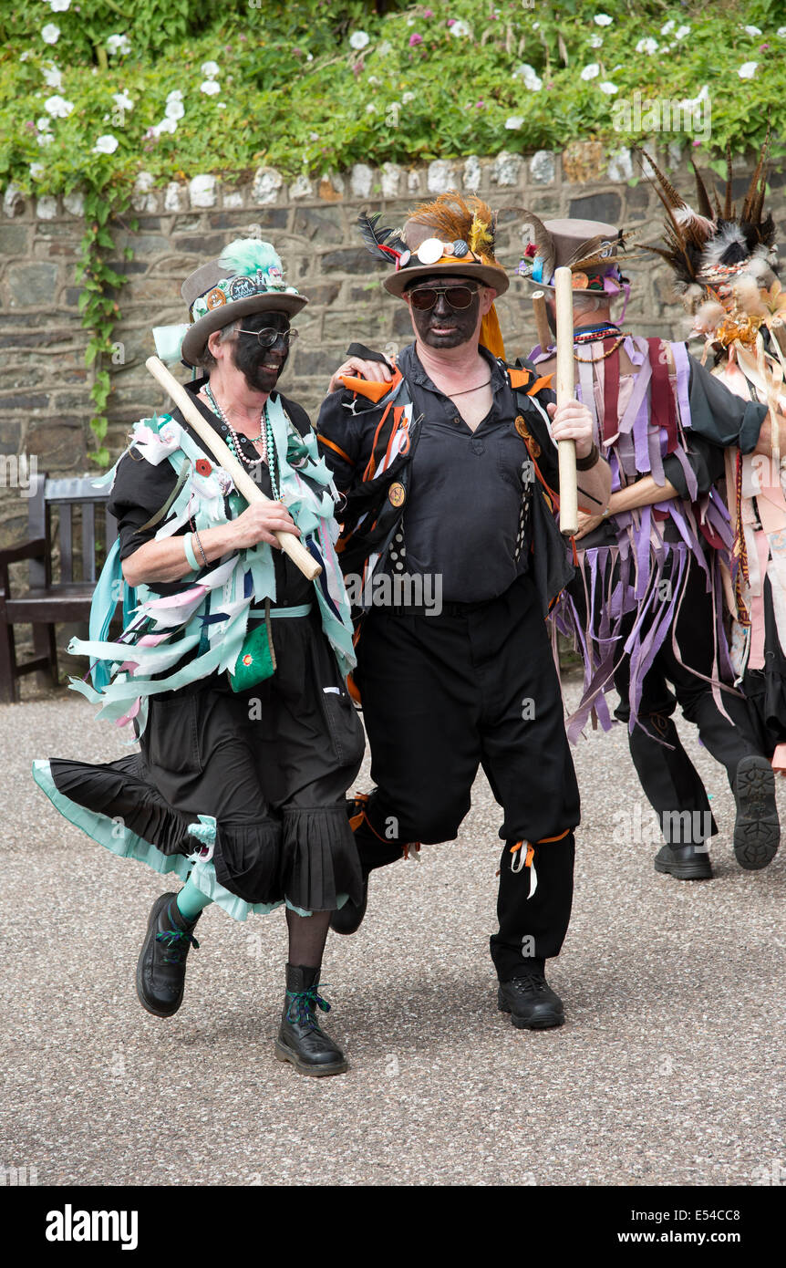 Morris dancers with blackened faces dancing on the Pier at Ilfracombe ...