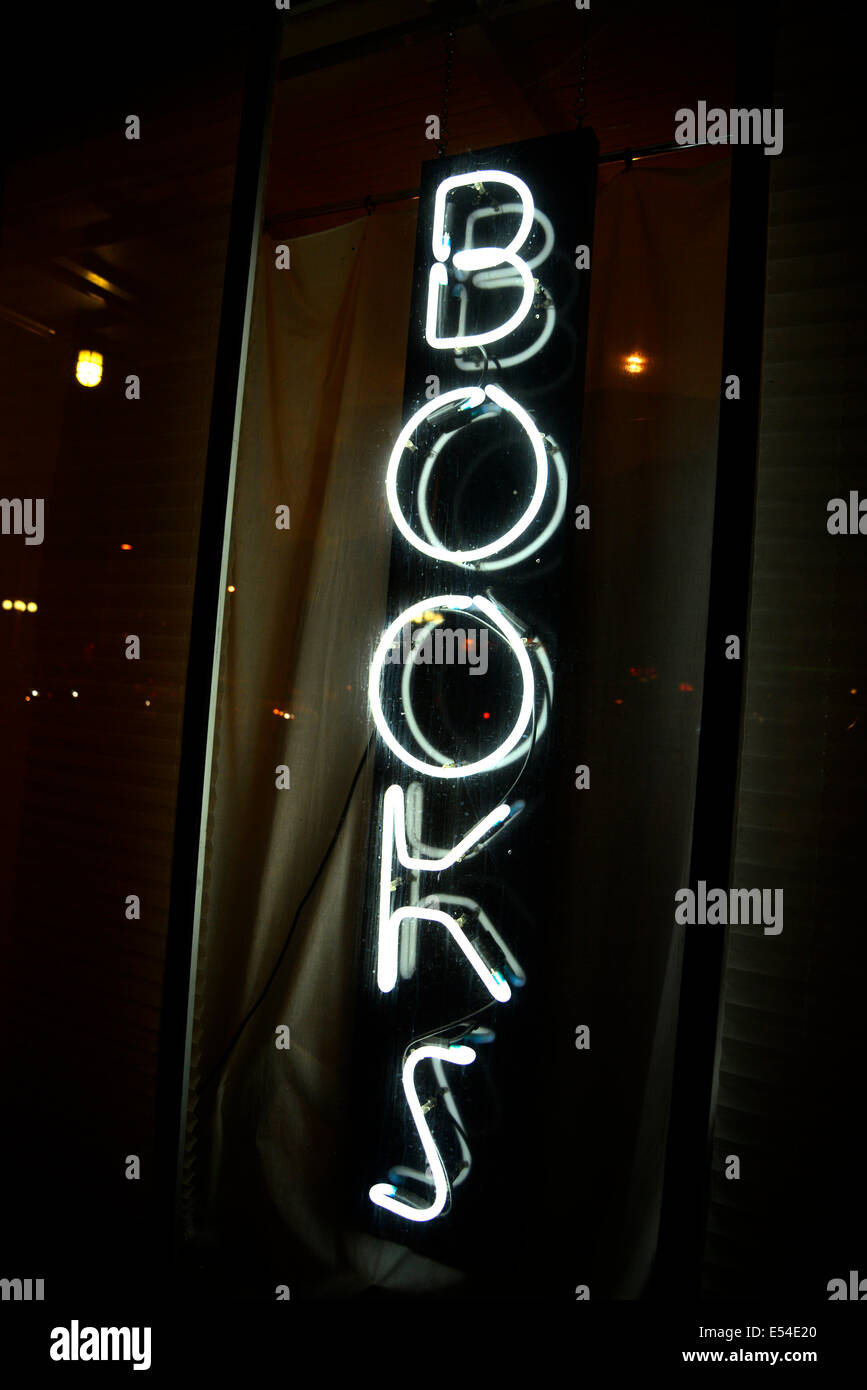 A neon sign in a bookstore Stock Photo - Alamy